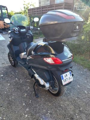 Black Piaggio MP3 2010 in Klaipeda, with an engine capacity of 56.00 L and mileage of 0 thousand km for 1650 €, photo 6 on AUTOMOTO.COM.LV