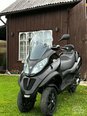 Melns Piaggio MP3 2011 Tauragė, ar dzinēja tilpumu 0.30 L un nobraukumu 0 tūkst. km par 1500 €, foto  vietnē AUTOMOTO.COM.LV