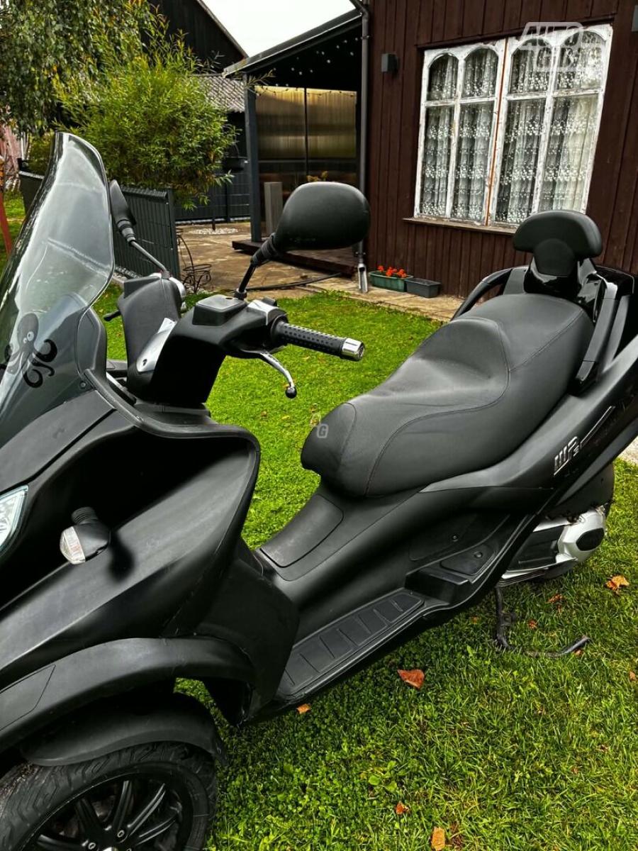 Melns Piaggio MP3 2011 Tauragė, ar dzinēja tilpumu 0.30 L un nobraukumu 0 tūkst. km par 1500 €, foto 5 vietnē AUTOMOTO.COM.LV