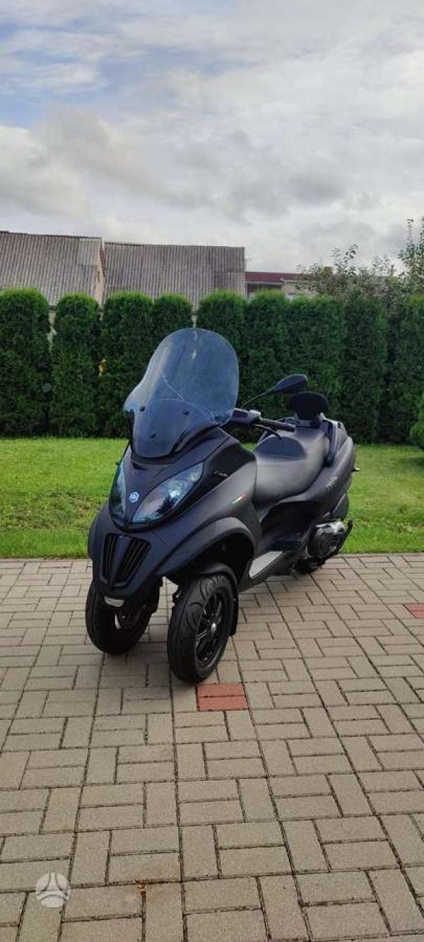 Black Piaggio MP3 2012 in Taurage, with an engine capacity of 0.50 L and mileage of 22 thousand km for 2900 €, photo 1 on AUTOMOTO.COM.LV