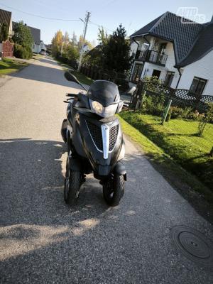 Melns Piaggio MP3 2012 Vilkaviškis, ar dzinēja tilpumu 0.30 L un nobraukumu 18 tūkst. km par 1400 €, foto 7 vietnē AUTOMOTO.COM.LV