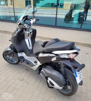 Black Piaggio MP3 2014 in Utena, with an engine capacity of 0.30 L and mileage of 33 thousand km for 1950 €, photo 3 on AUTOMOTO.COM.LV