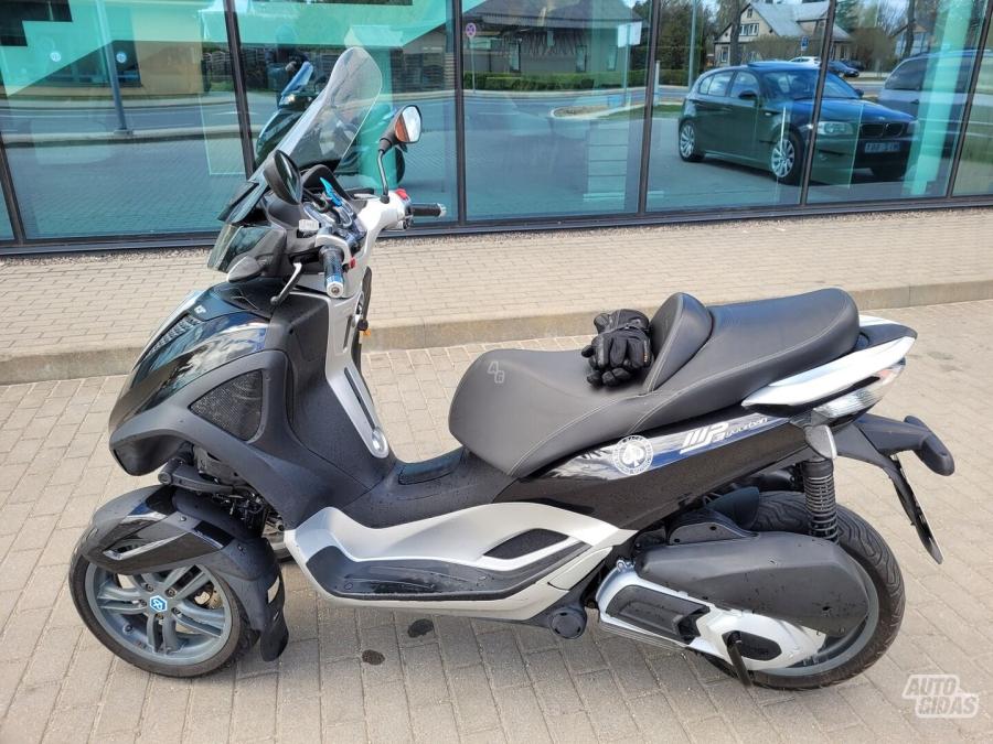 Black Piaggio MP3 2014 in Utena, with an engine capacity of 0.30 L and mileage of 33 thousand km for 1950 €, photo 10 on AUTOMOTO.COM.LV