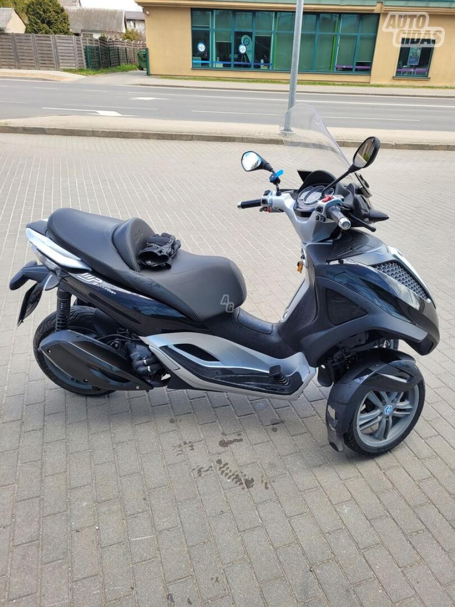 Black Piaggio MP3 2014 in Utena, with an engine capacity of 0.30 L and mileage of 33 thousand km for 1950 €, photo 12 on AUTOMOTO.COM.LV