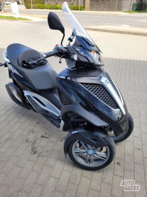 Black Piaggio MP3 2014 in Utena, with an engine capacity of 0.30 L and mileage of 33 thousand km for 1950 €, photo 14 on AUTOMOTO.COM.LV