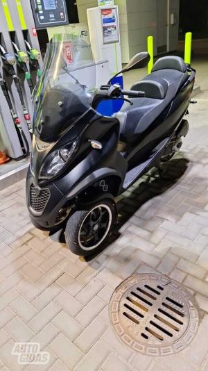 Black Piaggio MP3 2016 in Taurage, with an engine capacity of 0.30 L and mileage of 12 thousand km for 2600 €, photo  on AUTOMOTO.COM.LV