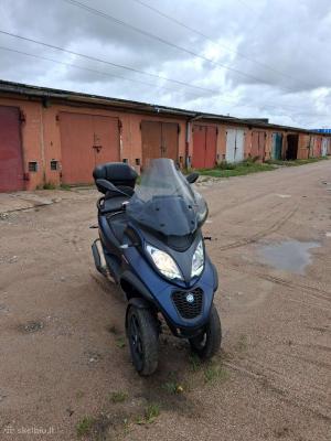 Blue Piaggio MP3 2021 in Klaipeda, with an engine capacity of 0.50 L and mileage of 26 thousand km for 5500 €, photo  on AUTOMOTO.COM.LV