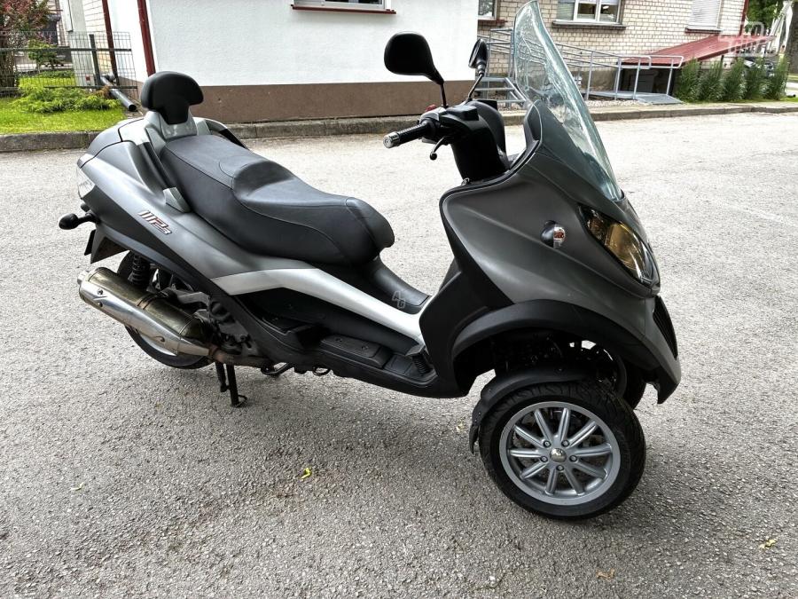 Pelēks Piaggio MP3 2009 Ariogala, ar dzinēja tilpumu 0.40 L un nobraukumu 28 tūkst. km par 1850 €, foto 7 vietnē AUTOMOTO.COM.LV