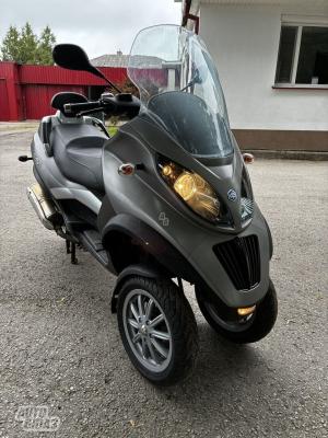 Pelēks Piaggio MP3 2009 Ariogala, ar dzinēja tilpumu 0.40 L un nobraukumu 28 tūkst. km par 1850 €, foto 9 vietnē AUTOMOTO.COM.LV