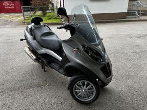 Pelēks Piaggio MP3 2009 Ariogala, ar dzinēja tilpumu 0.40 L un nobraukumu 28 tūkst. km par 1850 €, foto 13 vietnē AUTOMOTO.COM.LV
