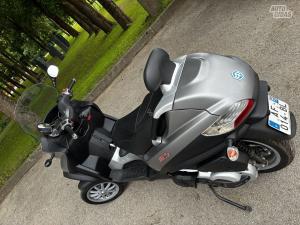 Pelēks Piaggio MP3 2009 Ariogala, ar dzinēja tilpumu 0.40 L un nobraukumu 28 tūkst. km par 1850 €, foto 14 vietnē AUTOMOTO.COM.LV