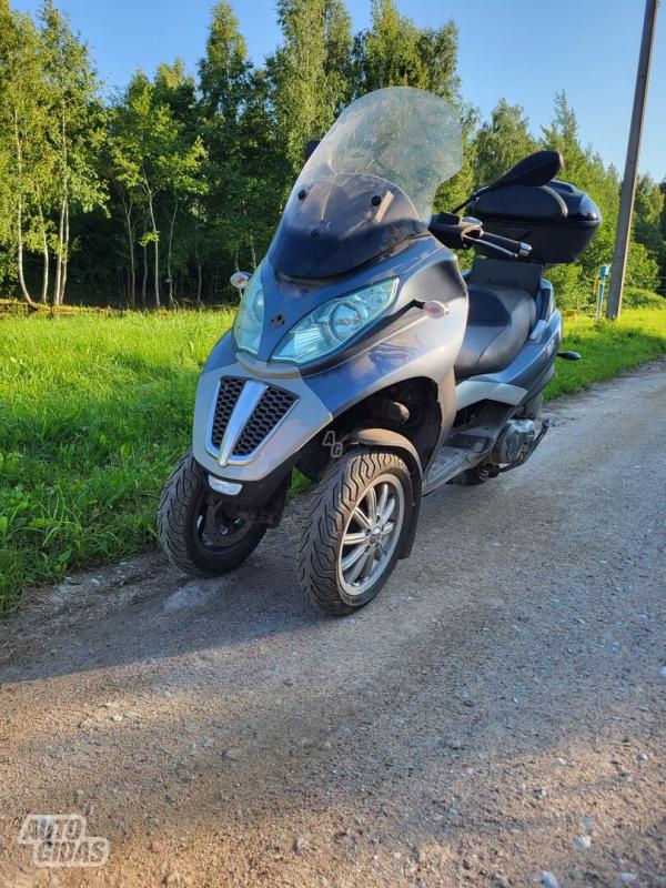 Pelēks Piaggio MP3 2014 Klaipėda, ar dzinēja tilpumu 0.50 L un nobraukumu 34 tūkst. km par 1300 €, foto 1 vietnē AUTOMOTO.COM.LV