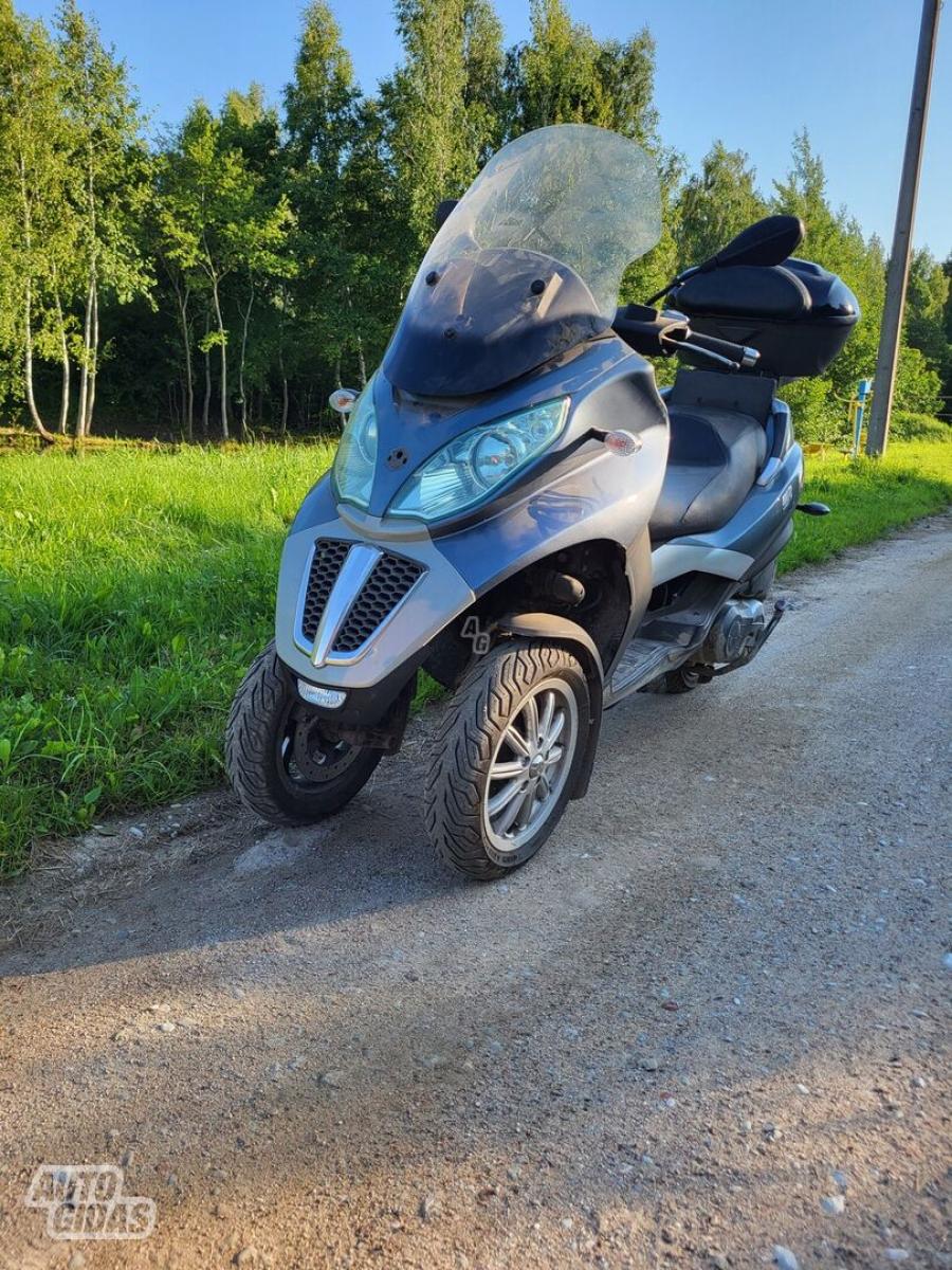 Grey Piaggio MP3 2014 in Klaipeda, with an engine capacity of 0.50 L and mileage of 34 thousand km for 1300 €, photo 1 on AUTOMOTO.COM.LV