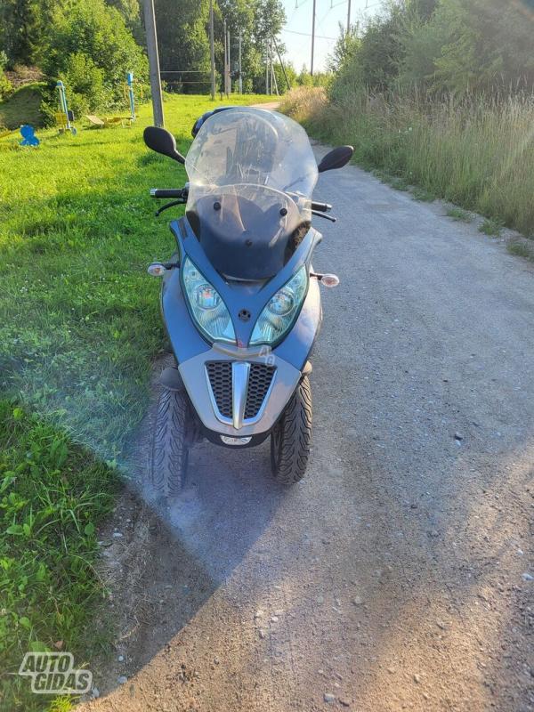 Pelēks Piaggio MP3 2014 Klaipėda, ar dzinēja tilpumu 0.50 L un nobraukumu 34 tūkst. km par 1300 €, foto 2 vietnē AUTOMOTO.COM.LV