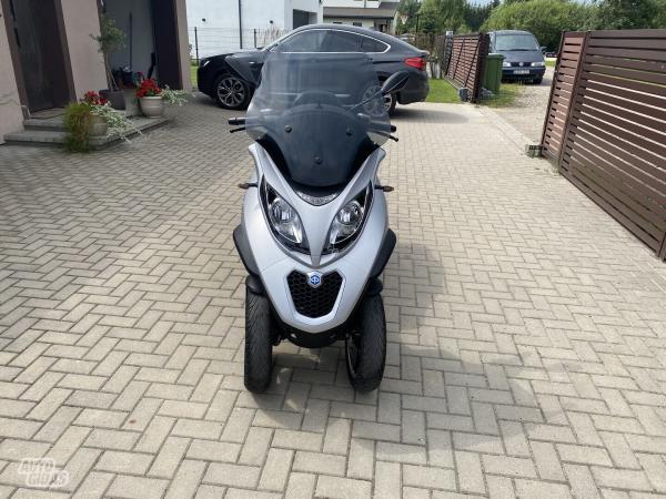 Pelēks Piaggio MP3 2015 Kauņa, ar dzinēja tilpumu 0.50 L un nobraukumu 8 tūkst. km par 3499 €, foto 8 vietnē AUTOMOTO.COM.LV