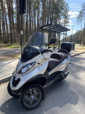 Pelēks Piaggio MP3 2016 Viļņa, ar dzinēja tilpumu 0.50 L un nobraukumu 37 tūkst. km par 4300 €, foto  vietnē AUTOMOTO.COM.LV