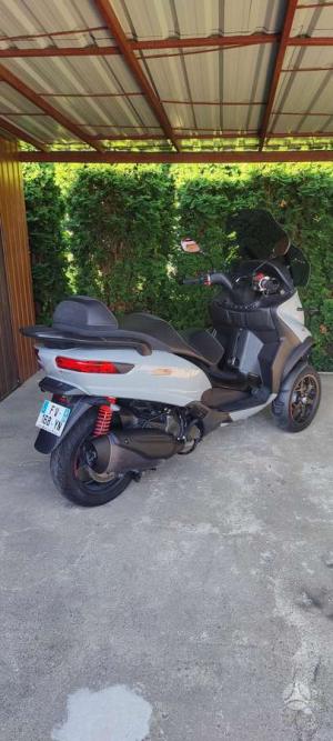 Pelēks Piaggio MP3 2020 Tauragė, ar dzinēja tilpumu 0.35 L un nobraukumu 12 tūkst. km par 2350 €, foto 4 vietnē AUTOMOTO.COM.LV