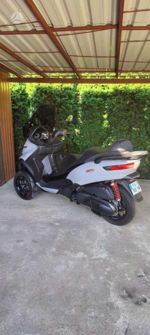 Pelēks Piaggio MP3 2020 Tauragė, ar dzinēja tilpumu 0.35 L un nobraukumu 12 tūkst. km par 2350 €, foto 6 vietnē AUTOMOTO.COM.LV