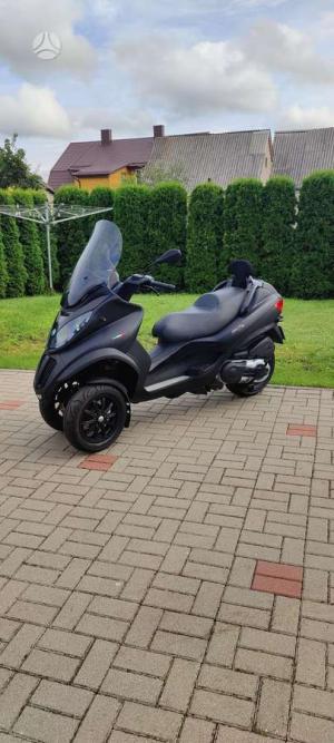Pelēks Piaggio MP3 2020 Tauragė, ar dzinēja tilpumu 0.35 L un nobraukumu 12 tūkst. km par 2350 €, foto 9 vietnē AUTOMOTO.COM.LV
