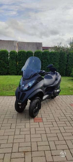 Pelēks Piaggio MP3 2020 Tauragė, ar dzinēja tilpumu 0.35 L un nobraukumu 12 tūkst. km par 2350 €, foto 12 vietnē AUTOMOTO.COM.LV