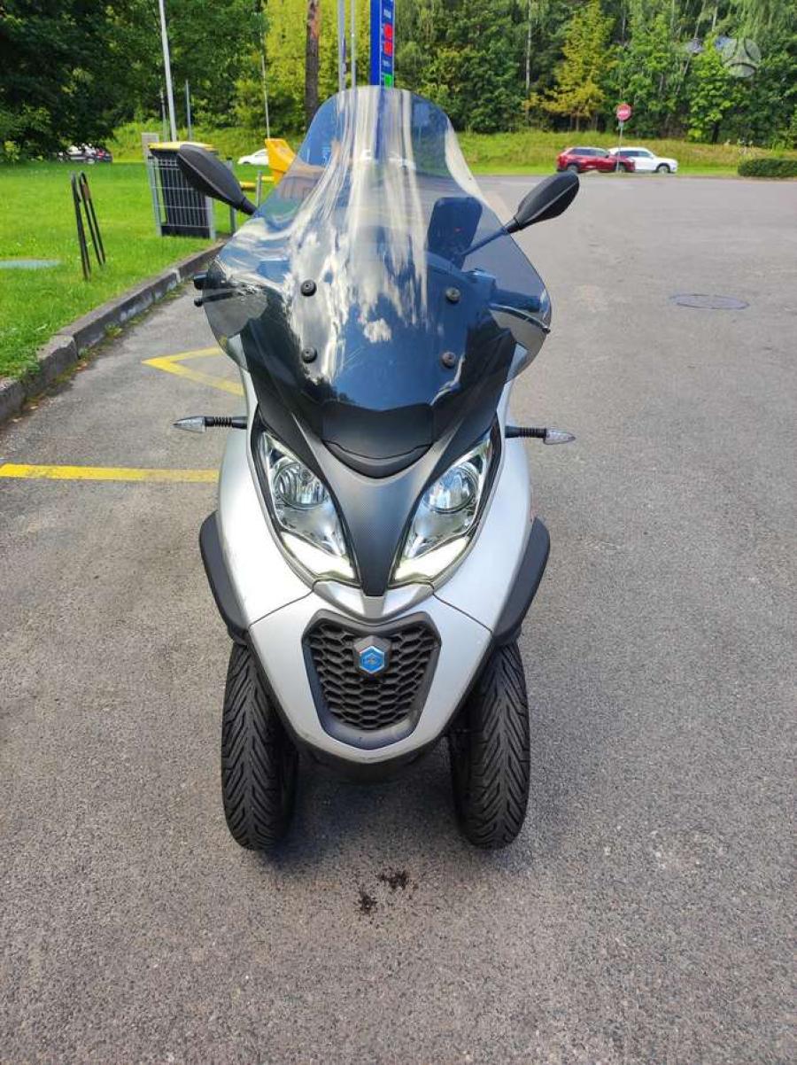 Pelēks Piaggio MP3 2021 Viļņa, ar dzinēja tilpumu 0.40 L un nobraukumu 34 tūkst. km par 4600 €, foto 4 vietnē AUTOMOTO.COM.LV