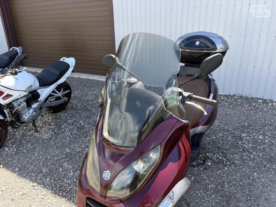 Piaggio MP3 2007 in Kelme, with an engine capacity of 0.13 L and mileage of 33 thousand km for 515 €, photo 8 on AUTOMOTO.COM.LV