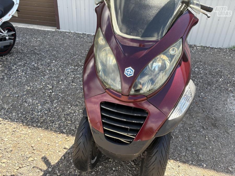 Piaggio MP3 2007 in Kelme, with an engine capacity of 0.13 L and mileage of 33 thousand km for 515 €, photo 9 on AUTOMOTO.COM.LV