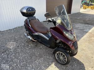 Piaggio MP3 2007 Kelmė, ar dzinēja tilpumu 0.13 L un nobraukumu 33 tūkst. km par 515 €, foto  vietnē AUTOMOTO.COM.LV