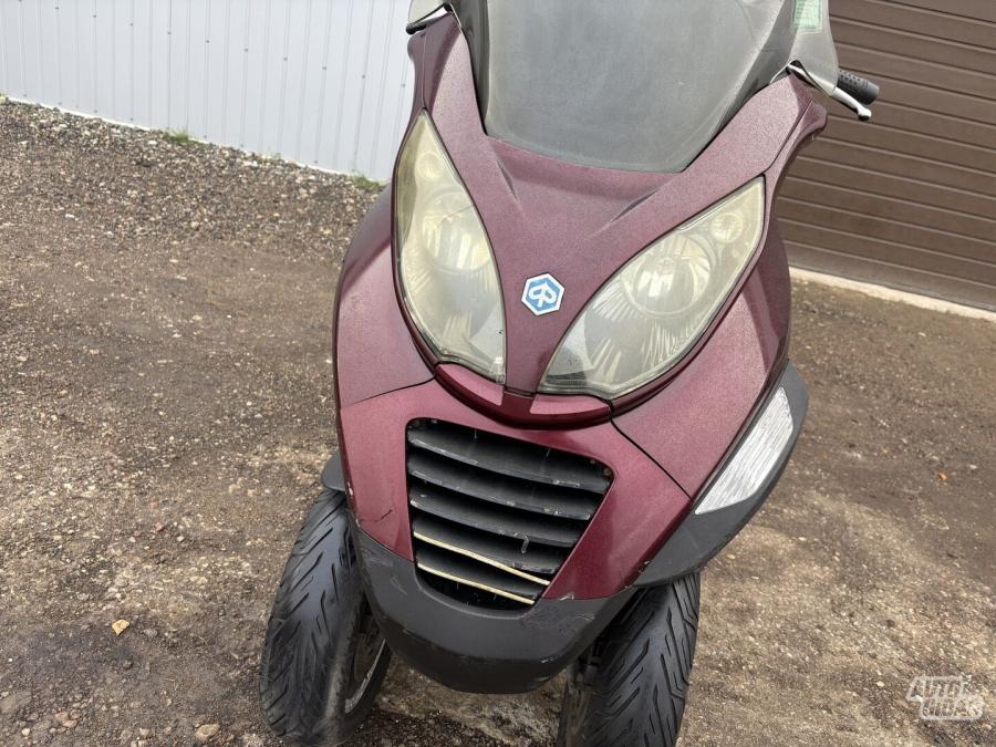 Piaggio MP3 2007 Kelmė, ar dzinēja tilpumu 0.13 L un nobraukumu 33 tūkst. km par 465 €, foto 8 vietnē AUTOMOTO.COM.LV