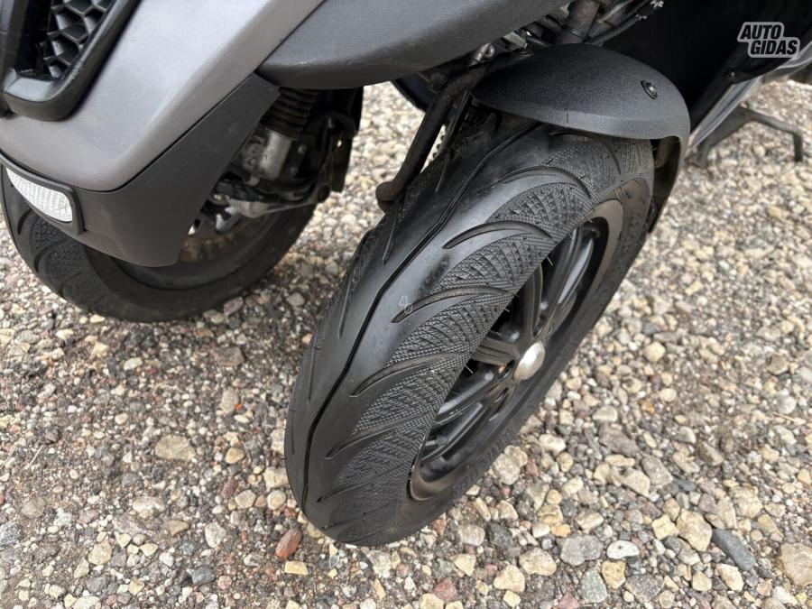 Piaggio MP3 2009 Kelmė, ar dzinēja tilpumu 0.40 L un nobraukumu 36 tūkst. km par 1130 €, foto 9 vietnē AUTOMOTO.COM.LV