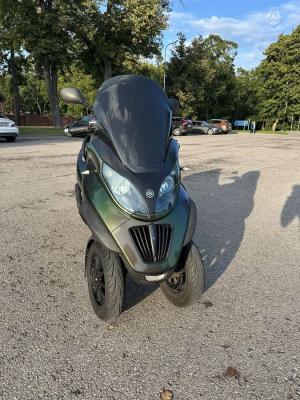 Piaggio MP3 2009 in Kaunas, with an engine capacity of 0.40 L and mileage of 49 thousand km for 1800 €, photo  on AUTOMOTO.COM.LV