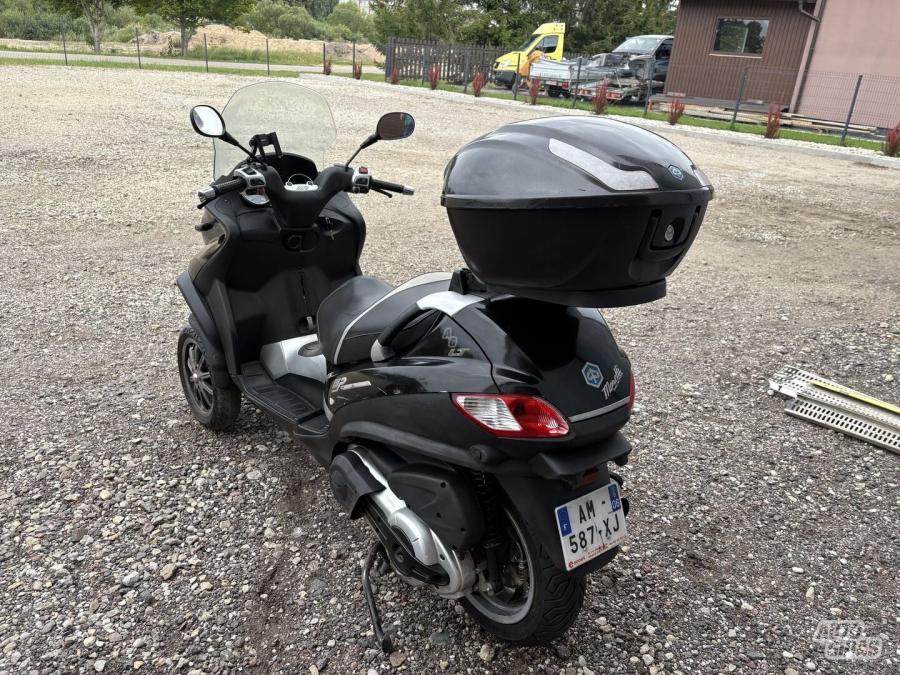 Piaggio MP3 2010 Kelmė, ar dzinēja tilpumu 0.40 L un nobraukumu 37 tūkst. km par 1030 €, foto 5 vietnē AUTOMOTO.COM.LV