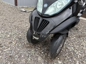 Piaggio MP3 2010 Kelmė, ar dzinēja tilpumu 0.40 L un nobraukumu 37 tūkst. km par 1030 €, foto 8 vietnē AUTOMOTO.COM.LV