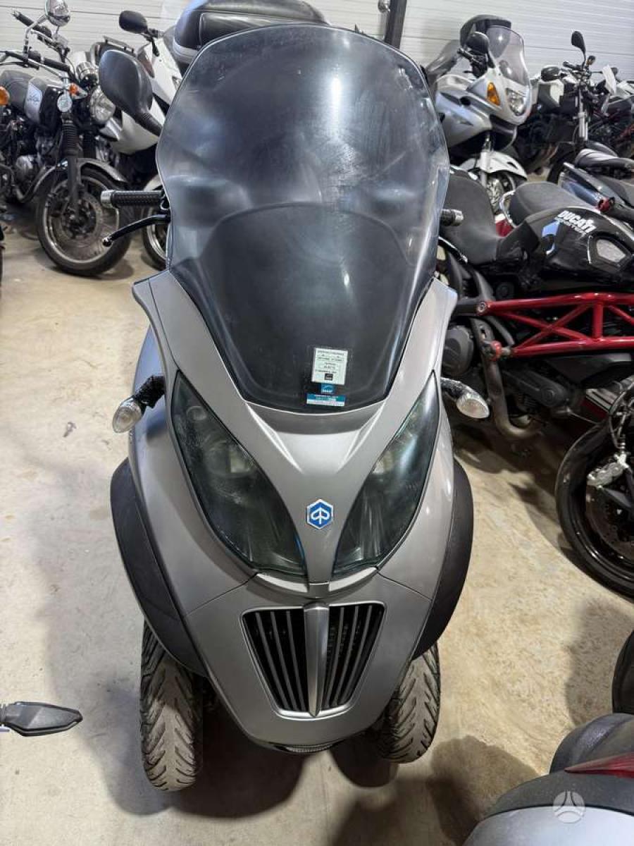 Piaggio MP3 2010 Tauragė, ar dzinēja tilpumu 0.25 L un nobraukumu 18 tūkst. km par 1250 €, foto 3 vietnē AUTOMOTO.COM.LV
