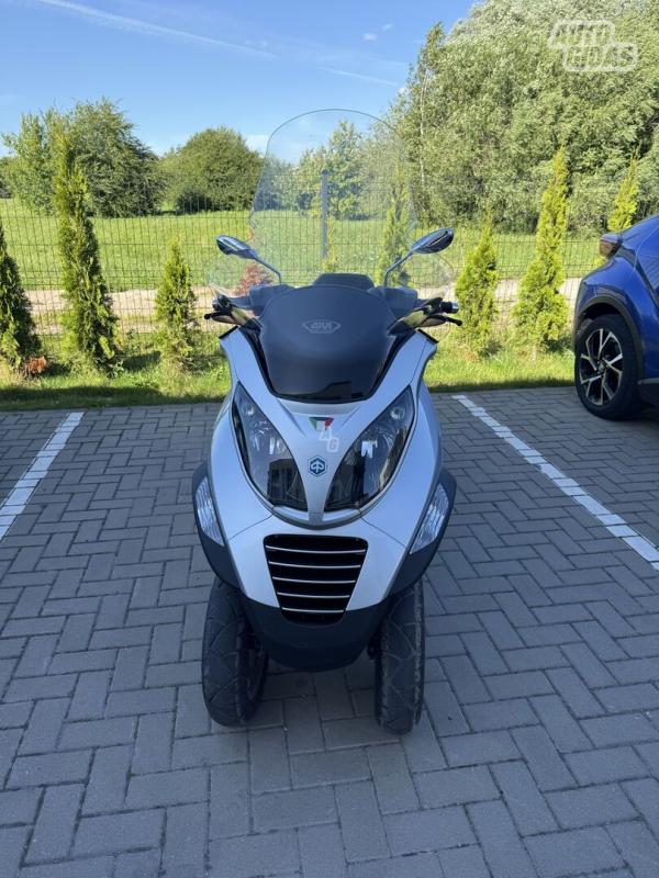Piaggio MP3 2011 Panevēža, ar dzinēja tilpumu 0.13 L un nobraukumu 9 tūkst. km par 1250 €, foto 5 vietnē AUTOMOTO.COM.LV