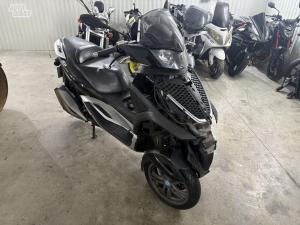 Piaggio MP3 2012 Kelmė, ar dzinēja tilpumu 0.30 L un nobraukumu 50 tūkst. km par 675 €, foto  vietnē AUTOMOTO.COM.LV