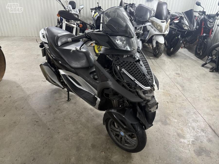Piaggio MP3 2012 Kelmė, ar dzinēja tilpumu 0.30 L un nobraukumu 50 tūkst. km par 675 €, foto 1 vietnē AUTOMOTO.COM.LV