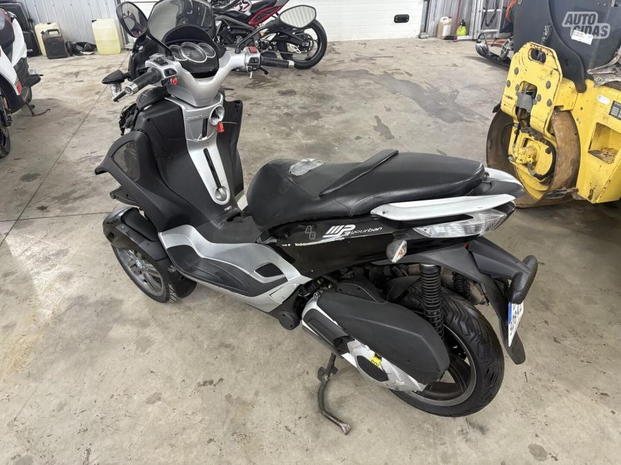 Piaggio MP3 2012 Kelmė, ar dzinēja tilpumu 0.30 L un nobraukumu 50 tūkst. km par 675 €, foto 4 vietnē AUTOMOTO.COM.LV
