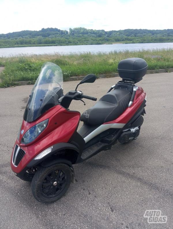 Red Piaggio MP3 2014 in Jurbarkas, with an engine capacity of 0.50 L and mileage of 27 thousand km for 3900 €, photo 4 on AUTOMOTO.COM.LV