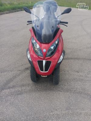 Red Piaggio MP3 2014 in Jurbarkas, with an engine capacity of 0.50 L and mileage of 27 thousand km for 3800 €, photo 6 on AUTOMOTO.COM.LV