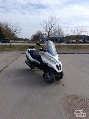 White Piaggio MP3 2010 in Mazeikiai, with an engine capacity of 0.13 L and mileage of 5 thousand km for 1150 €, photo  on AUTOMOTO.COM.LV