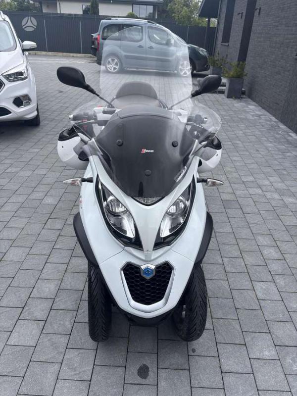 Белый Piaggio MP3 2014 в Клайпеда, объемом двигателя 0.50 л и пробегом 24 тыс. км за 3600 €, фото 1 на AUTOMOTO.COM.LV
