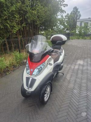 White Piaggio MP3 2014 in Kaunas, with an engine capacity of 0.50 L and mileage of 19 thousand km for 3850 €, photo  on AUTOMOTO.COM.LV