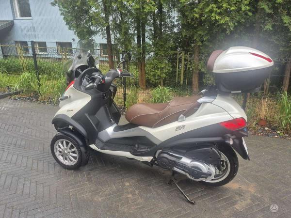 Белый Piaggio MP3 2014 в Каунас, объемом двигателя 0.50 л и пробегом 19 тыс. км за 3850 €, фото 3 на AUTOMOTO.COM.LV