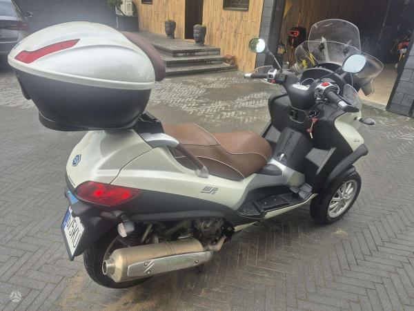 Белый Piaggio MP3 2014 в Каунас, объемом двигателя 0.50 л и пробегом 19 тыс. км за 3850 €, фото 4 на AUTOMOTO.COM.LV