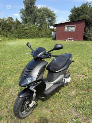 Black Piaggio NRG 2009 in Vilnius, with an engine capacity of 49.00 L and mileage of 8 thousand km for 600 €, photo  on AUTOMOTO.COM.LV