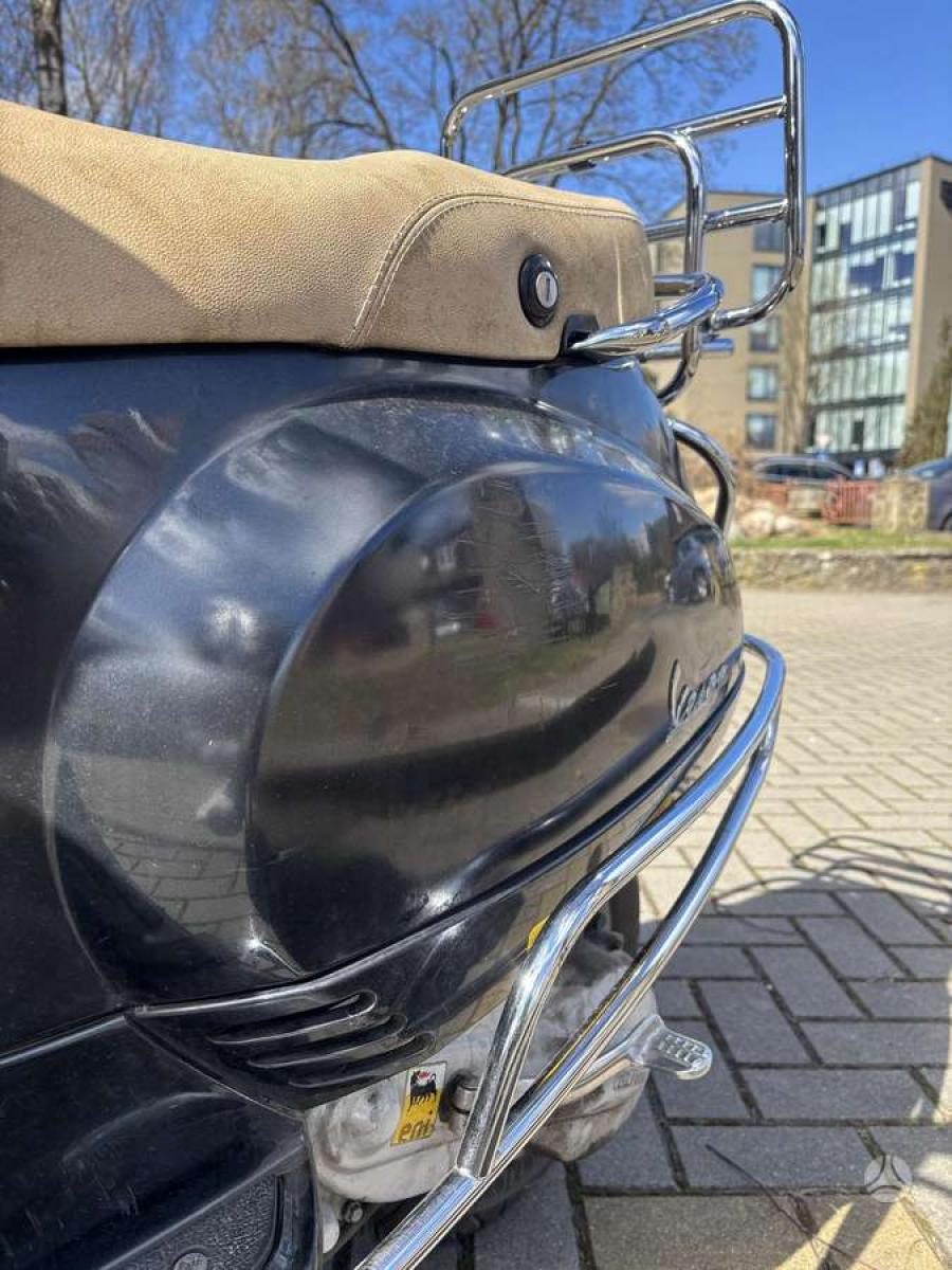 Melns Piaggio Vespa 2006 Viļņa, ar dzinēja tilpumu 49.00 L un nobraukumu 16 tūkst. km par 1200 €, foto 7 vietnē AUTOMOTO.COM.LV