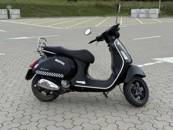 Melns Piaggio Vespa 2006 Viļņa, ar dzinēja tilpumu 0.24 L un nobraukumu 74 tūkst. km par 2000 €, foto 2 vietnē AUTOMOTO.COM.LV