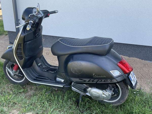 Black Piaggio Vespa 2013 in Vilnius, with an engine capacity of 0.13 L and mileage of 18 thousand km for 1299 €, photo 8 on AUTOMOTO.COM.LV