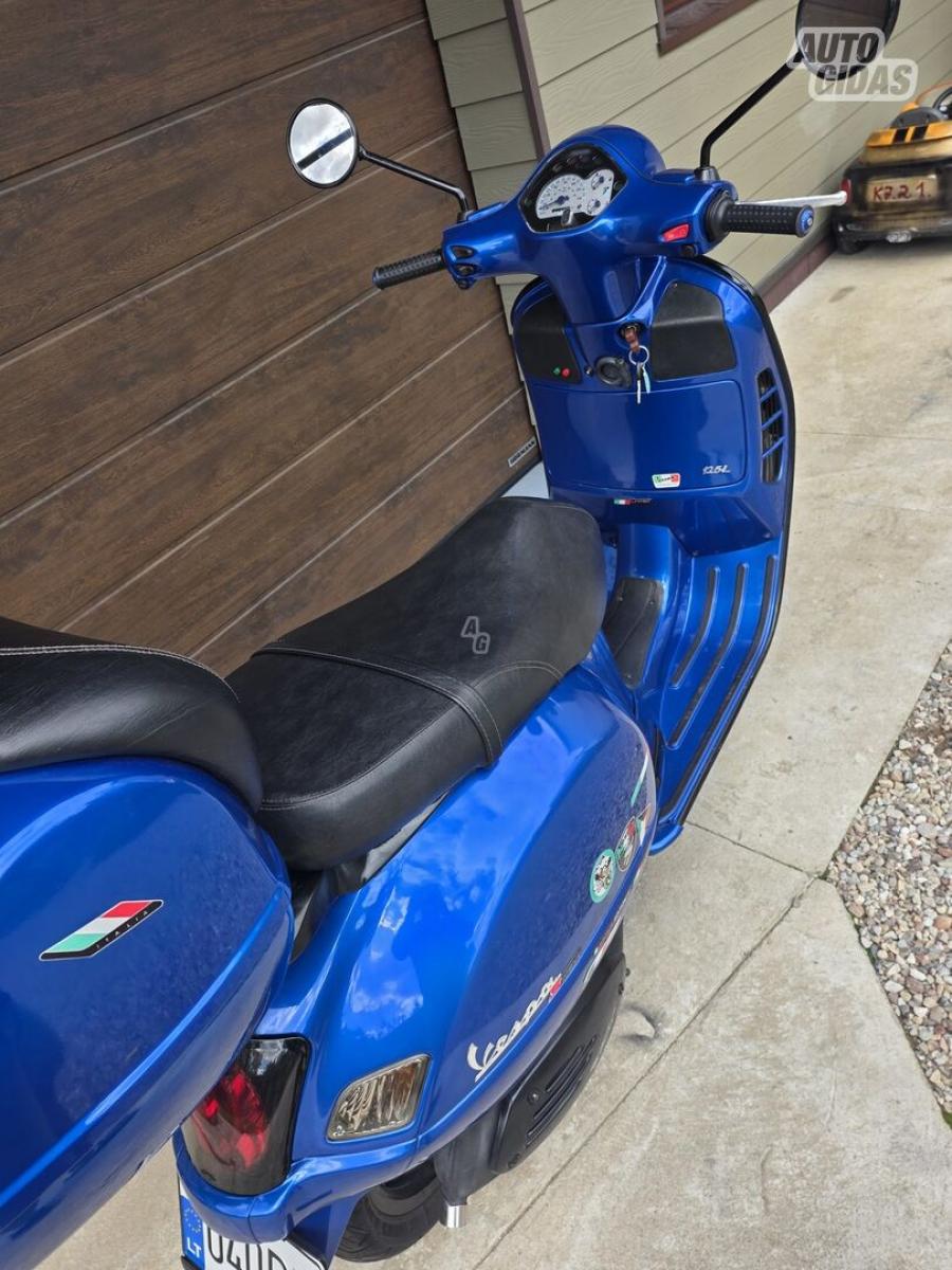 Blue Piaggio Vespa 2006 in Pasvalys, with an engine capacity of 0.13 L and mileage of 41 thousand km for 1499 €, photo 15 on AUTOMOTO.COM.LV